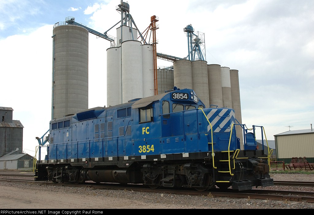 FC 3854 working at Farmers COOP